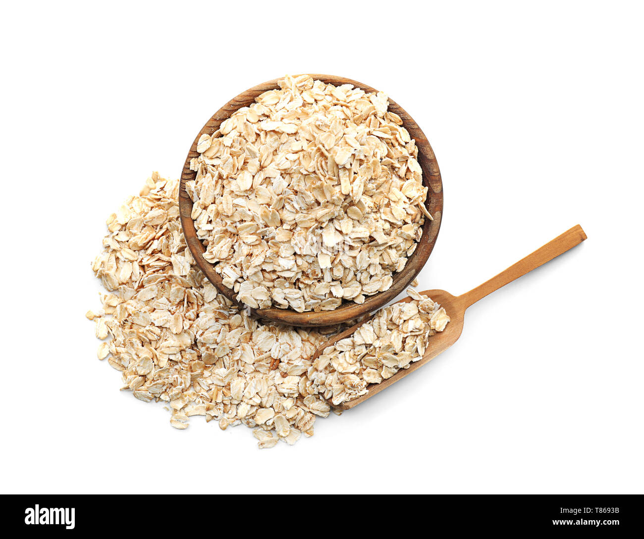 Bowl and scoop with raw oatmeal on white background Stock Photo - Alamy