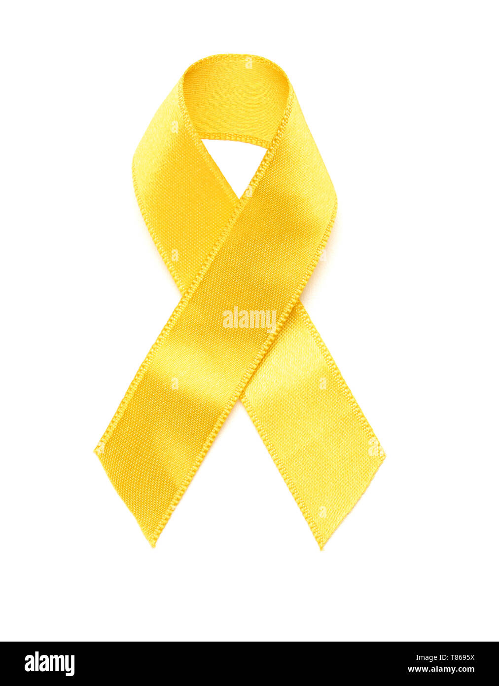 Yellow ribbon on white background. Cancer concept Stock Photo - Alamy