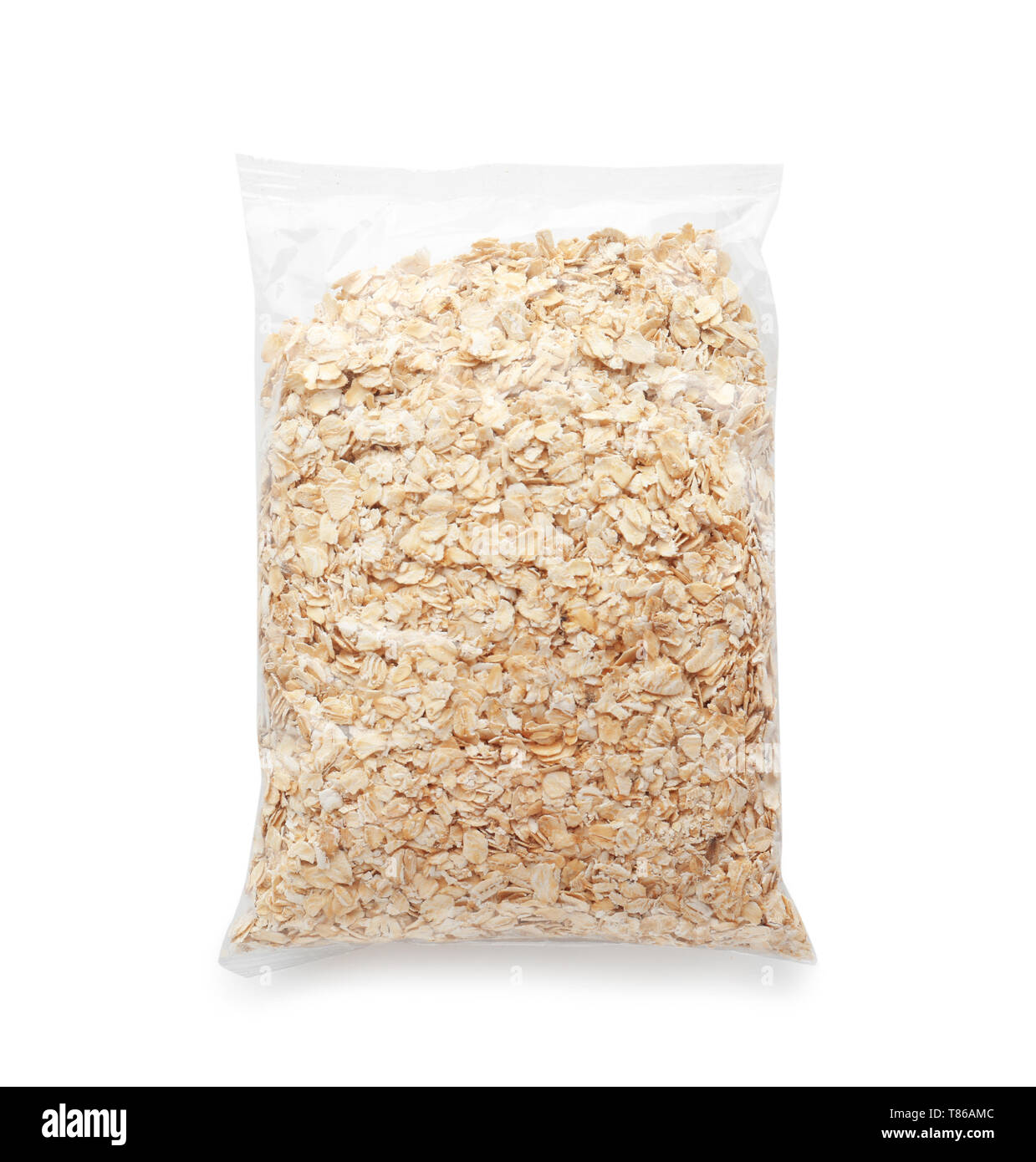 Plastic bag with raw oatmeal flakes on white background Stock Photo - Alamy