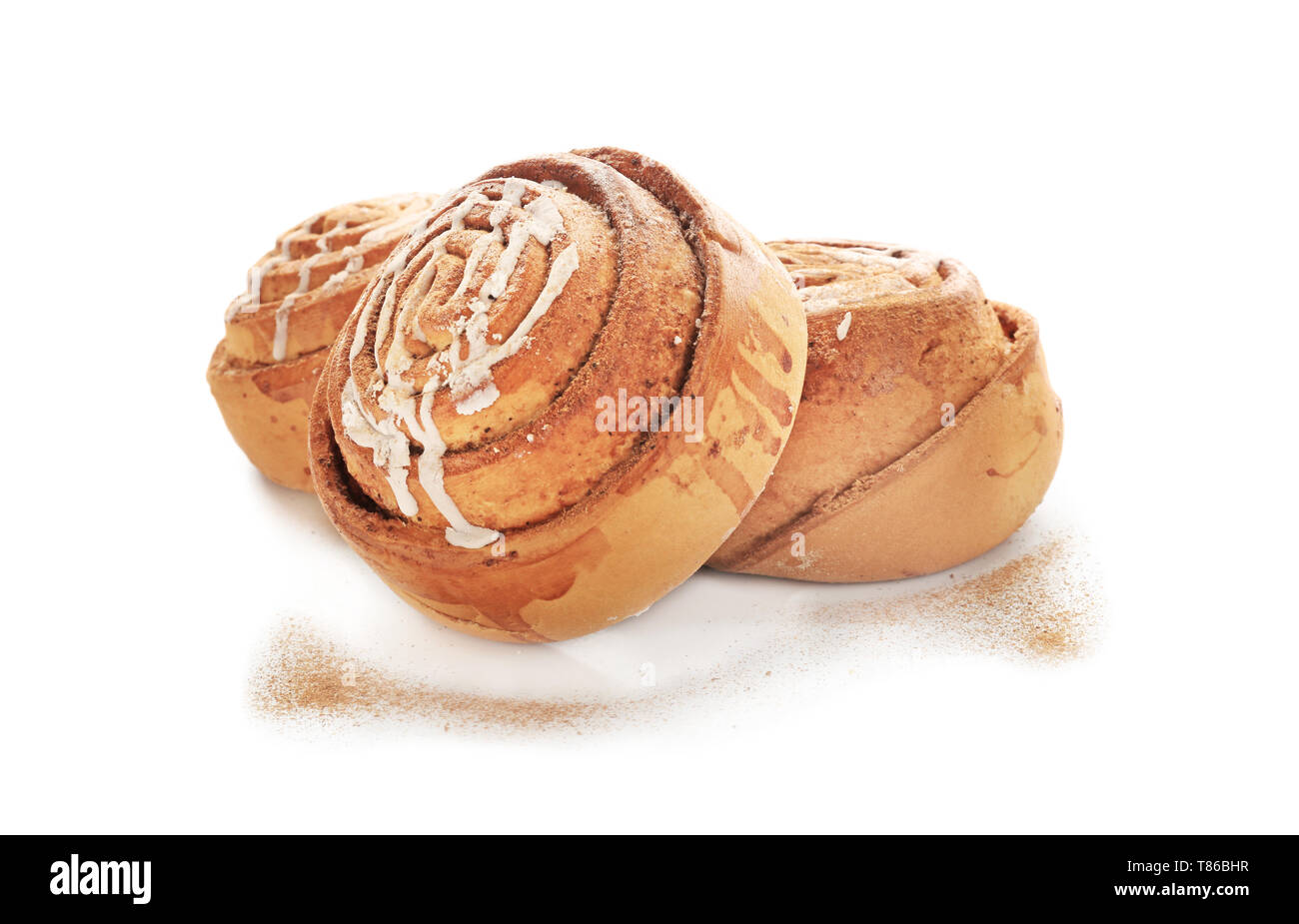 Delicious cinnamon buns on white background Stock Photo - Alamy