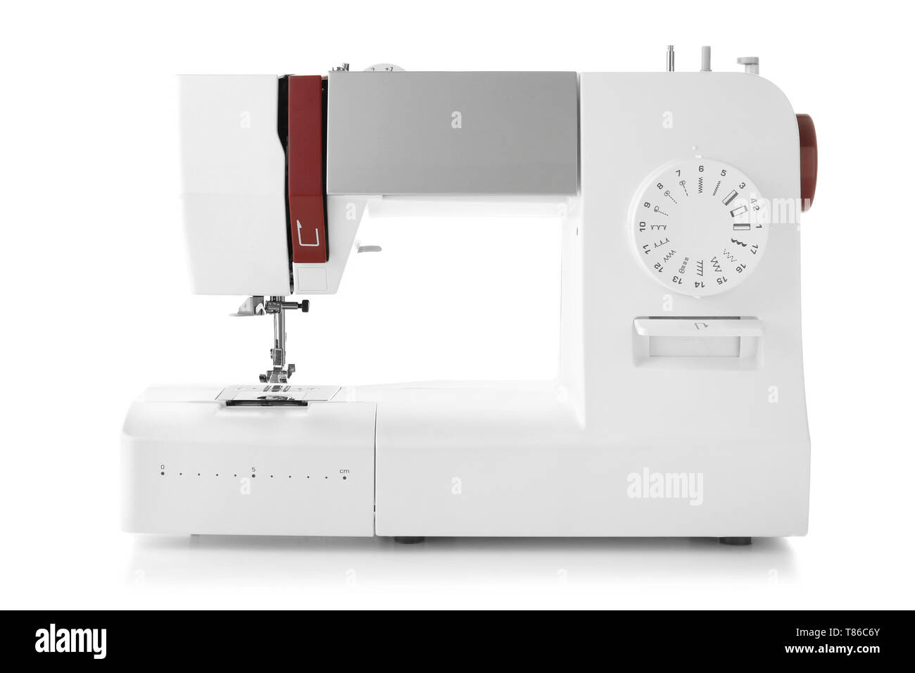 Modern sewing machine on white background Stock Photo - Alamy