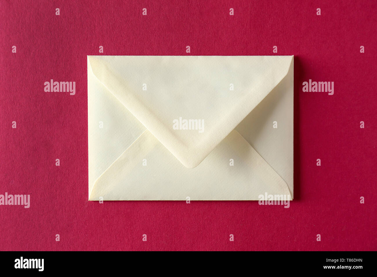 Mail envelope on color background Stock Photo - Alamy