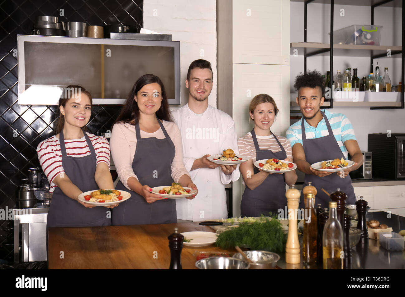 African chef plates hi-res stock photography and images - Alamy