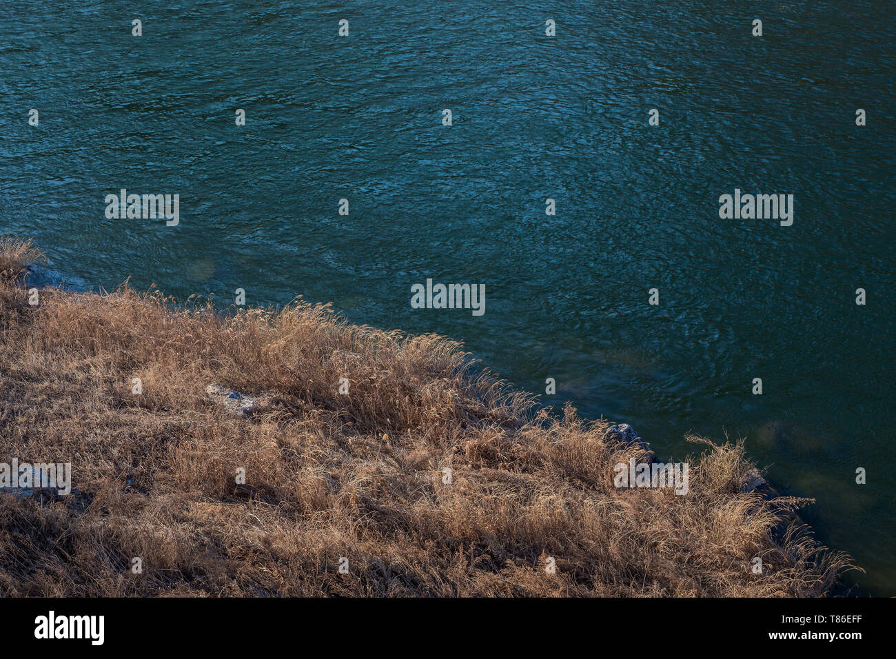 Land and water, blue and yellow Stock Photo - Alamy