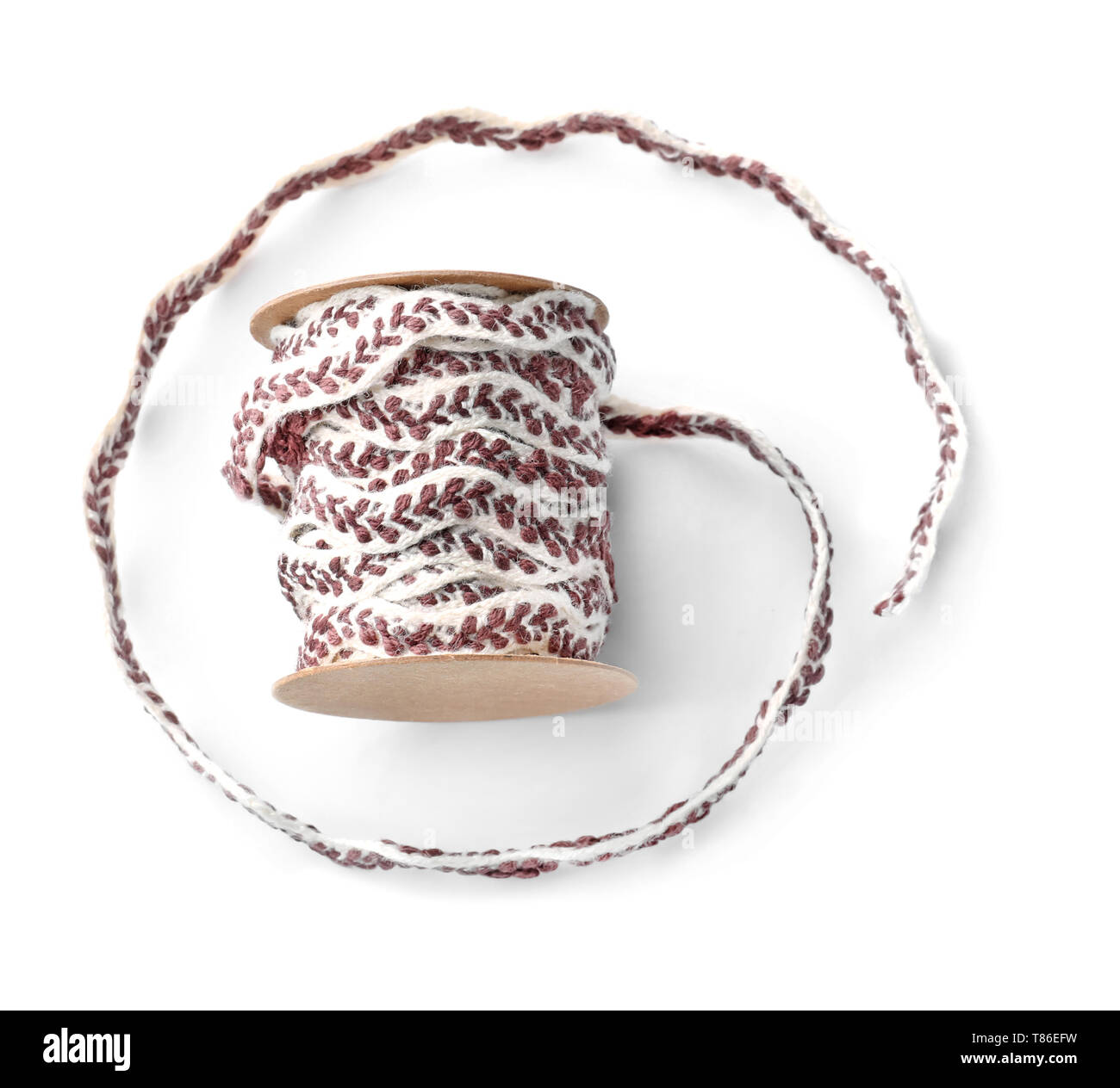 Bobbin with ribbon for scrapbooking on white background Stock Photo - Alamy