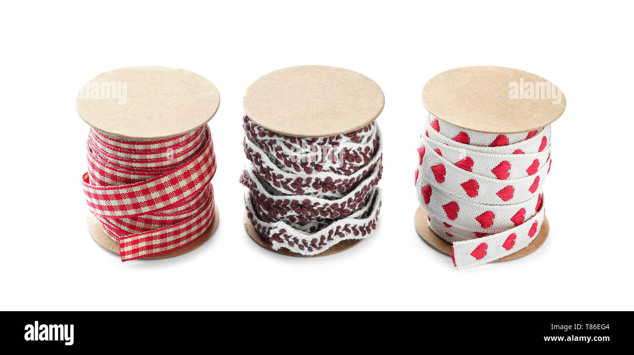 Bobbins with ribbons for scrapbooking on white background Stock Photo ...