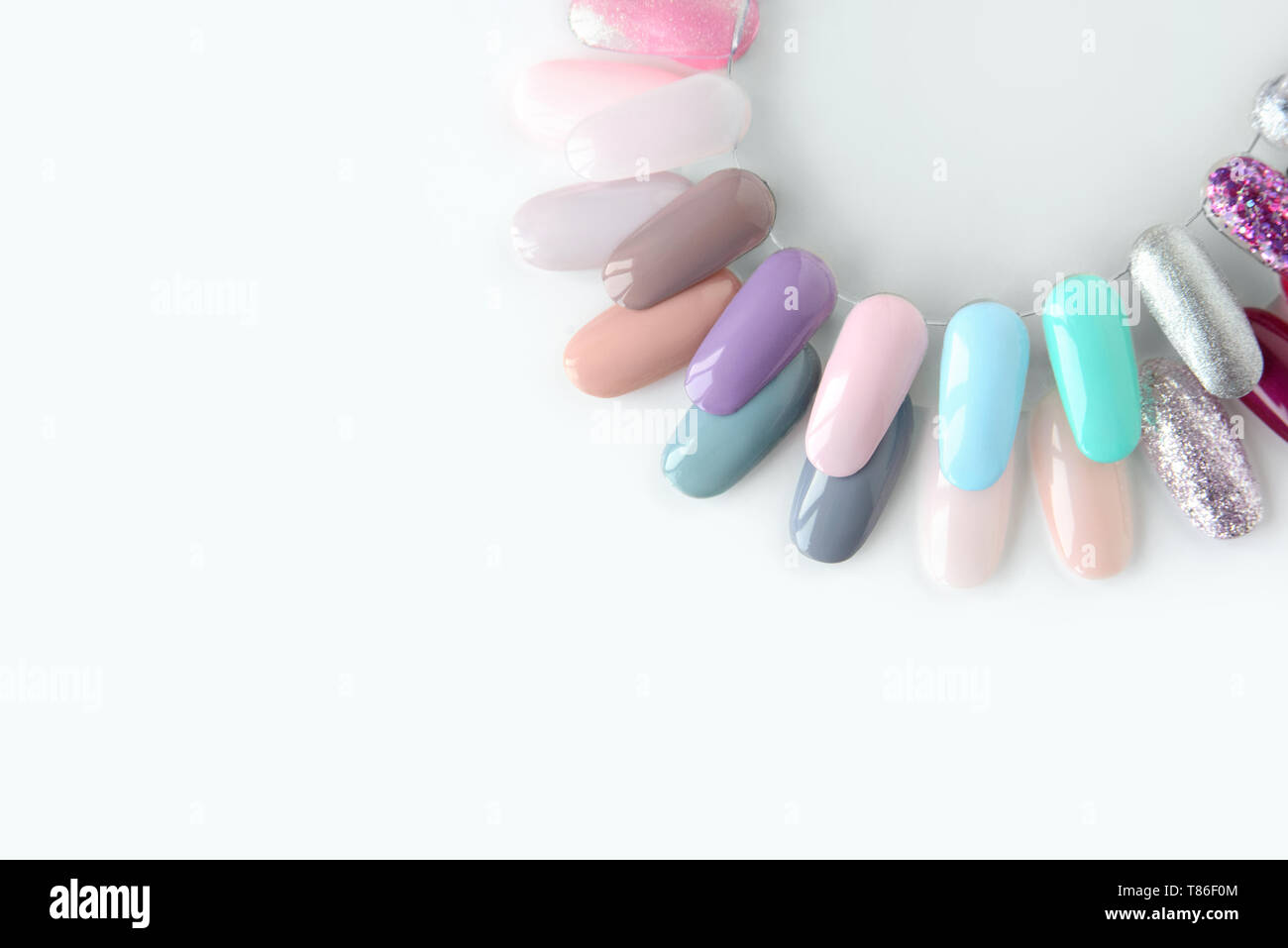 Nail polish samples in different bright colors. Colorful nail lacquer ...