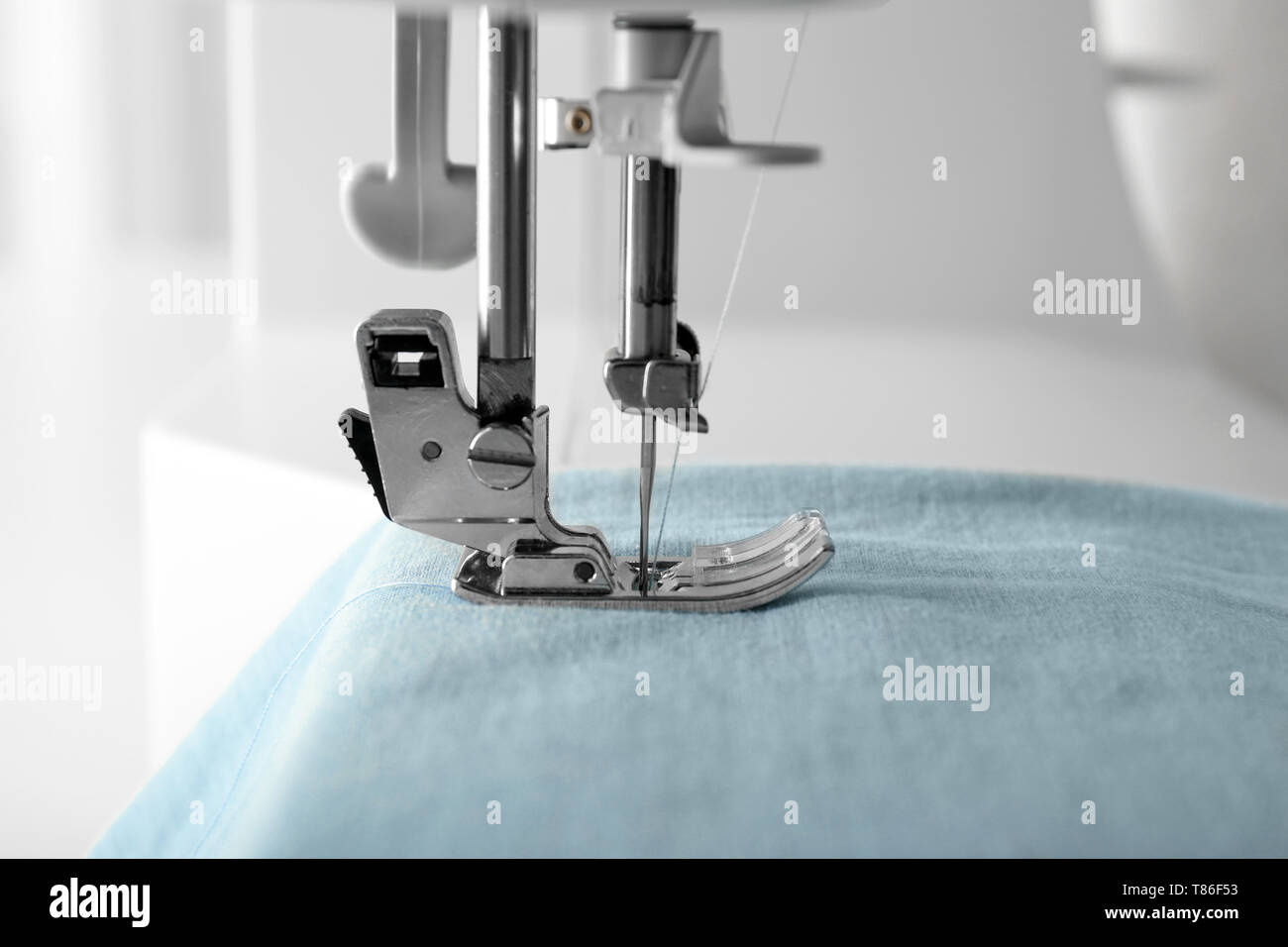Sewing machine with fabric, closeup Stock Photo - Alamy