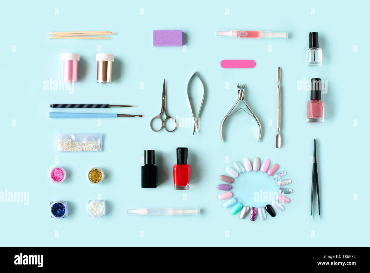 Set of various manicure and pedicure tools and accessories on light ...