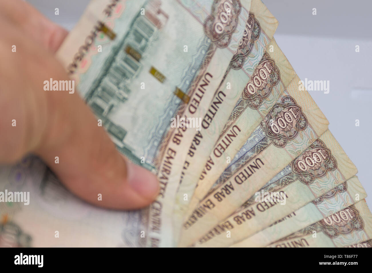 Uae dirhams hand hi-res stock photography and images - Alamy