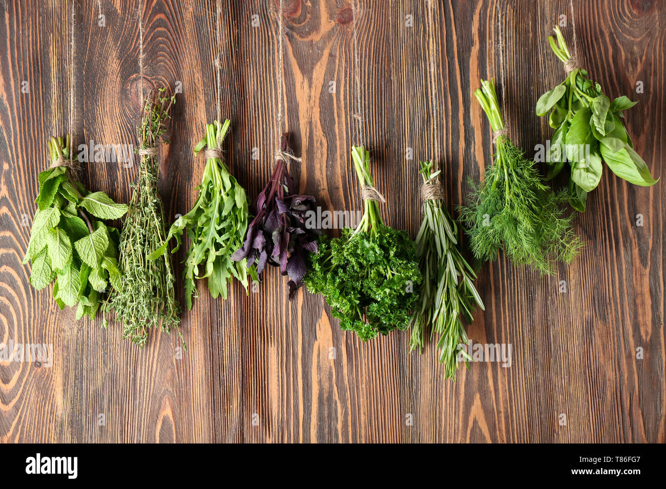 Bunches different aromatic herbs hi-res stock photography and images ...