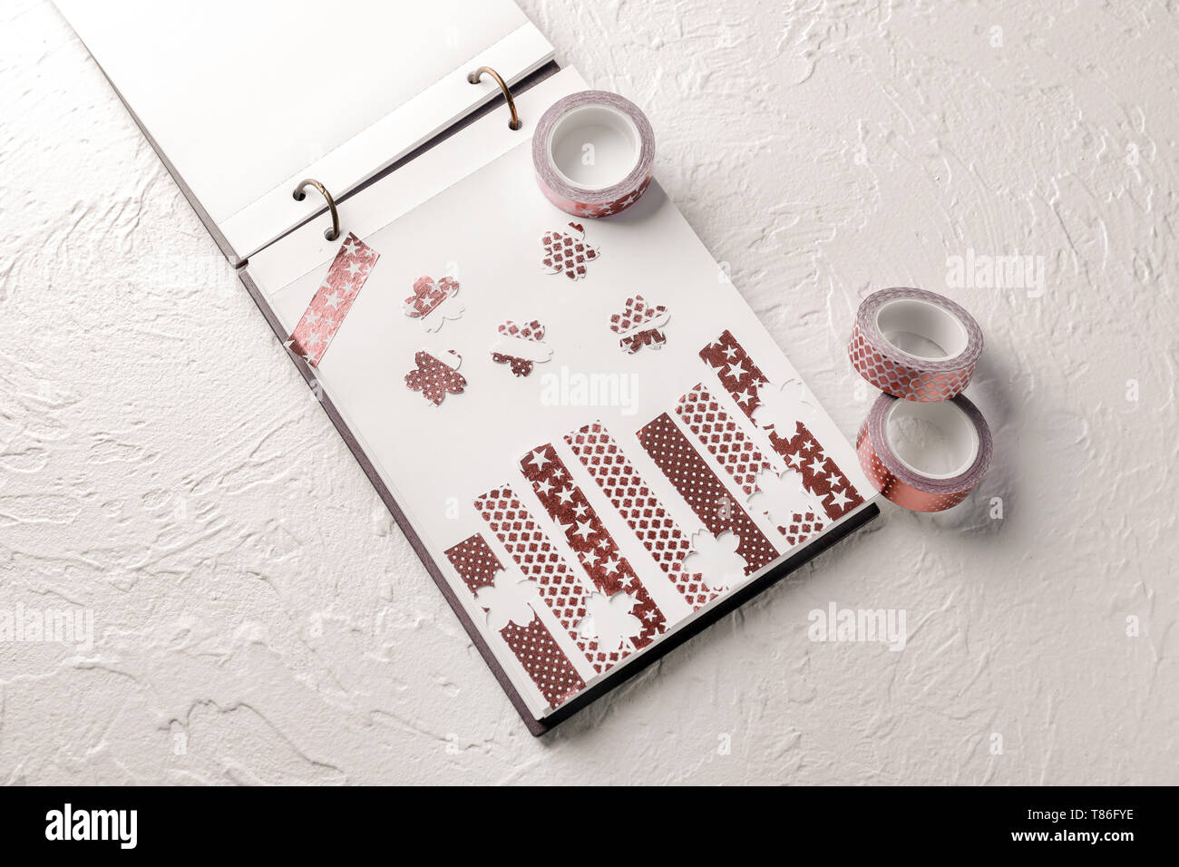 Scrapbook with tapes on light background Stock Photo - Alamy