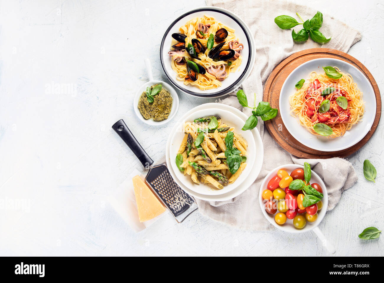 Plates of pasta. Italan food. Top view with copy space Stock Photo - Alamy
