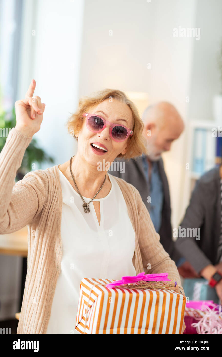 Old age woman pointing finger hi-res stock photography and images - Alamy