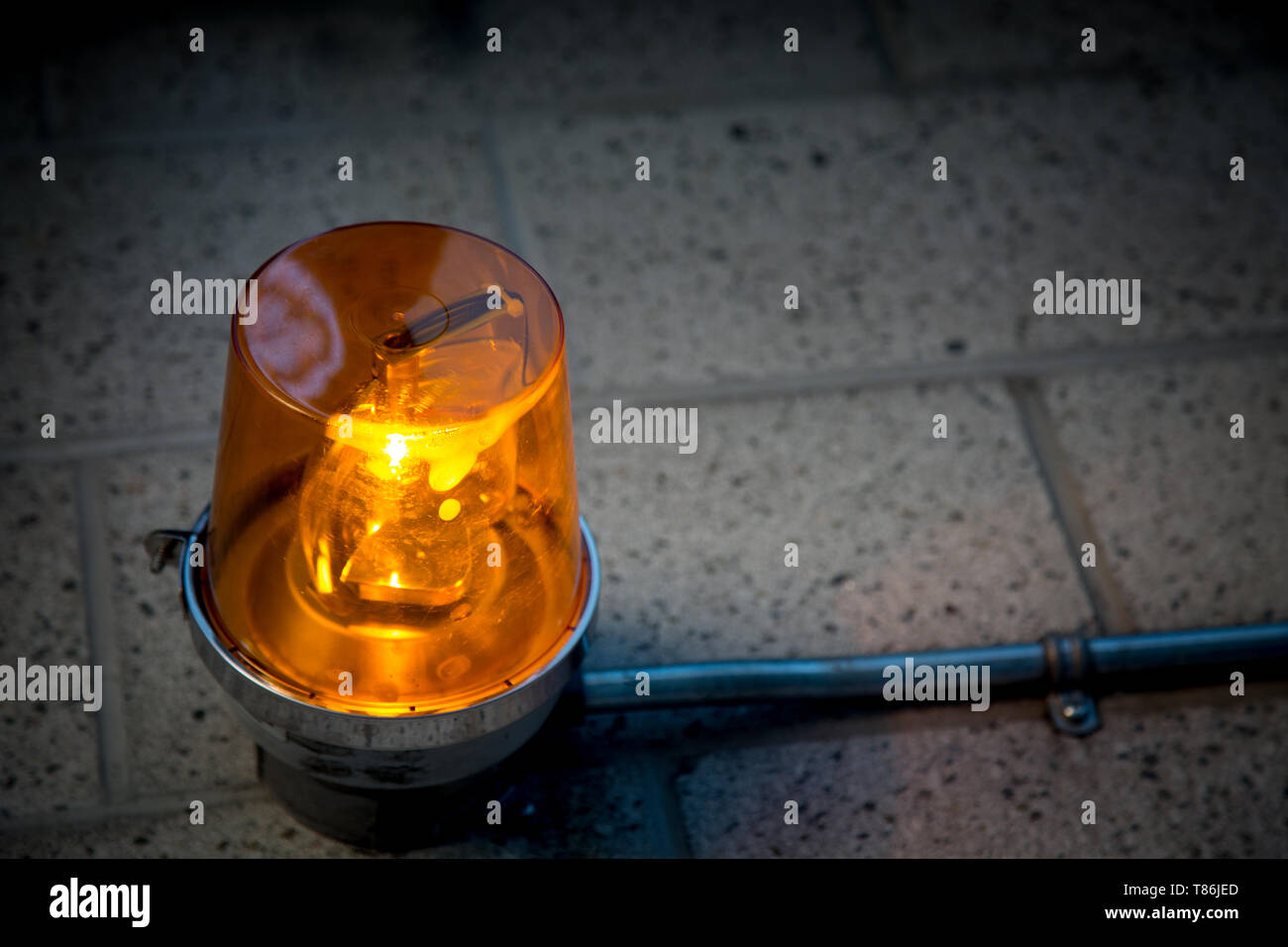 Emergency orange alert light closeup object detail concept warning ...