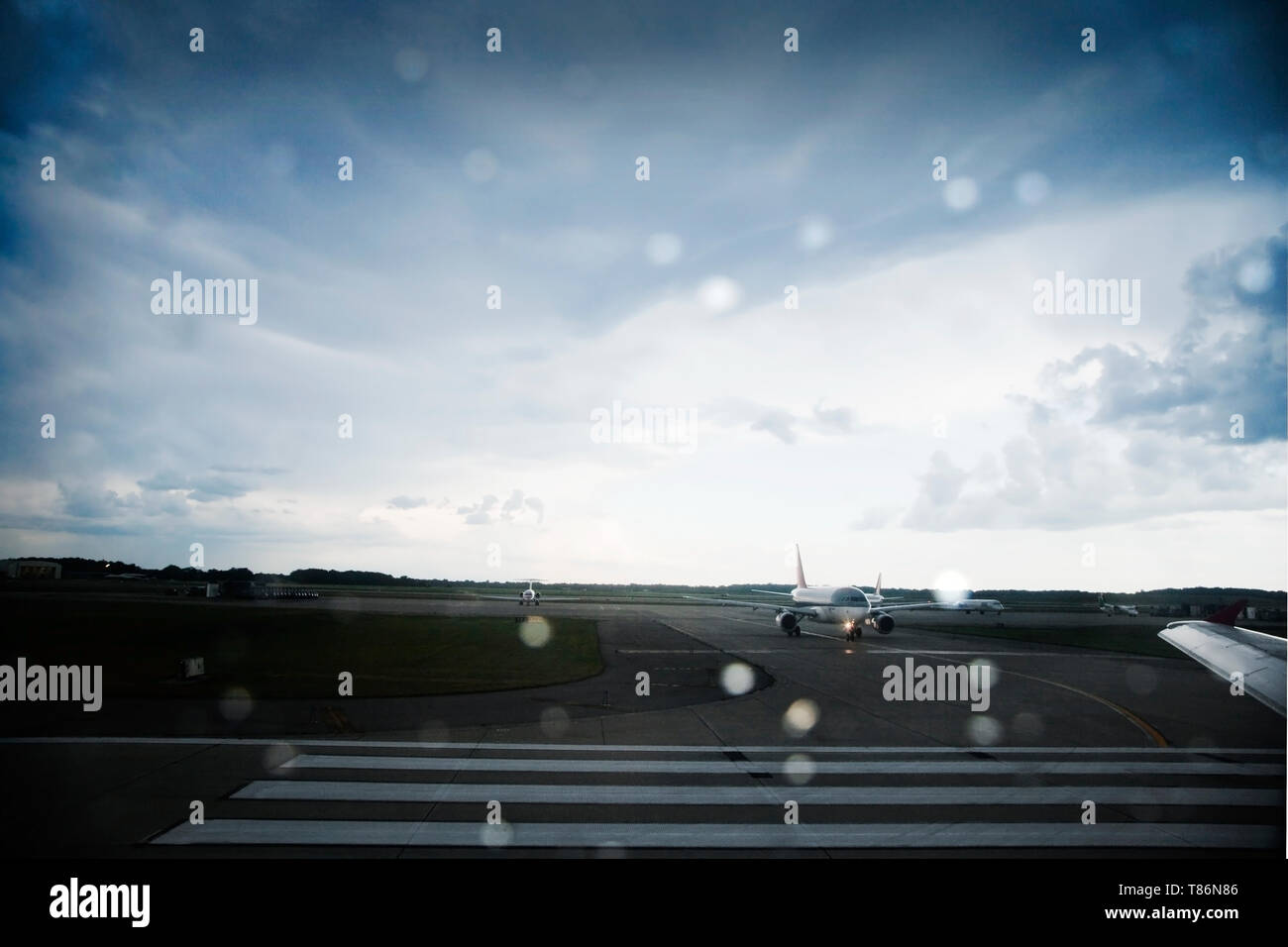 Airplane on Runway Stock Photo - Alamy
