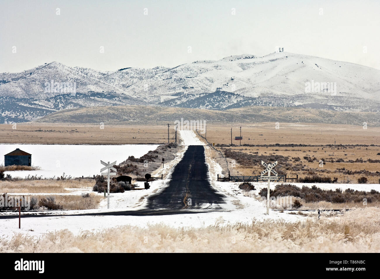 Snow Covered Railroad Crossing Stock Photo - Alamy