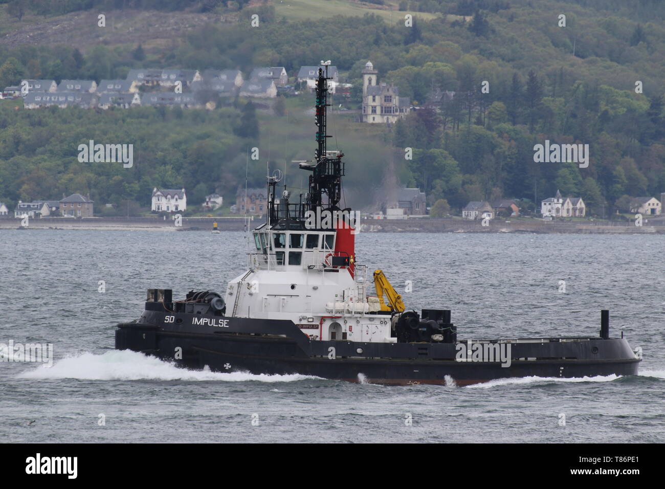 Tug boat and war ship hi-res stock photography and images - Alamy