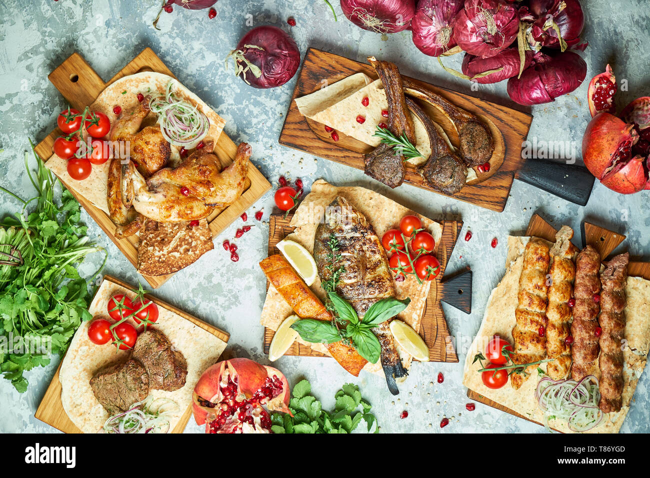 Plates of meat with barbecue Stock Photo - Alamy