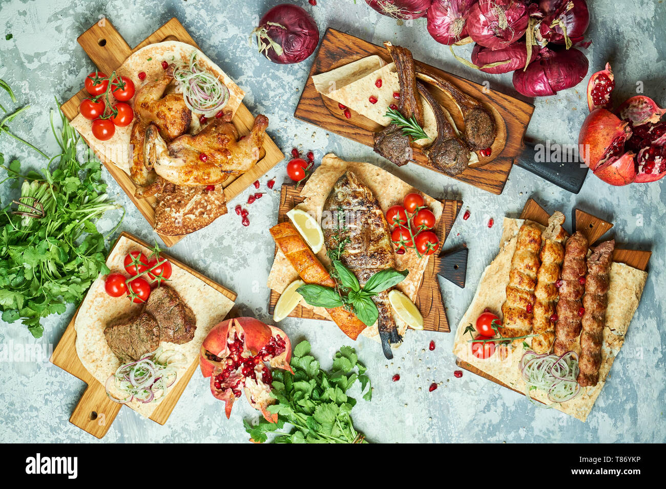 Plates of meat with barbecue Stock Photo - Alamy