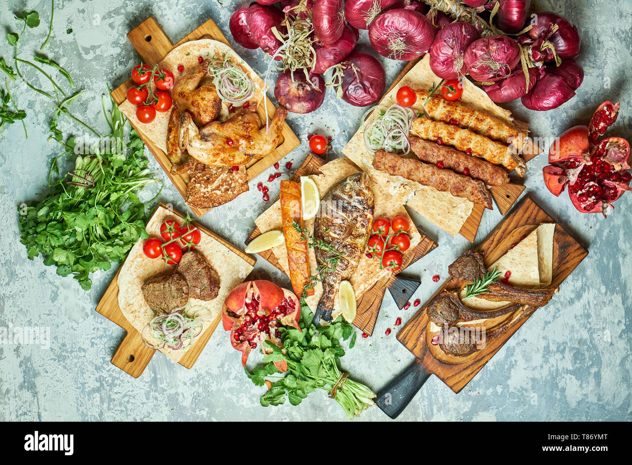 Plates of meat with barbecue Stock Photo - Alamy