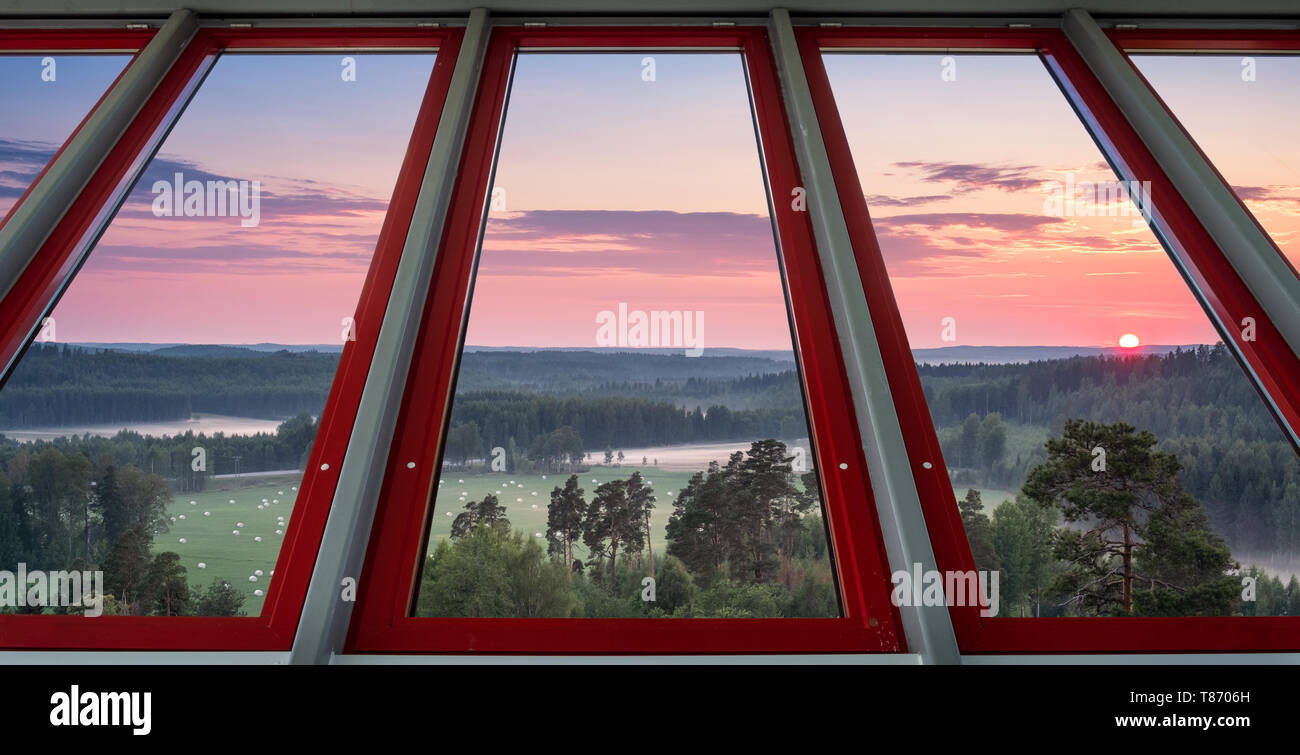 Scenic landscape through window with forest and sunset at summer ...