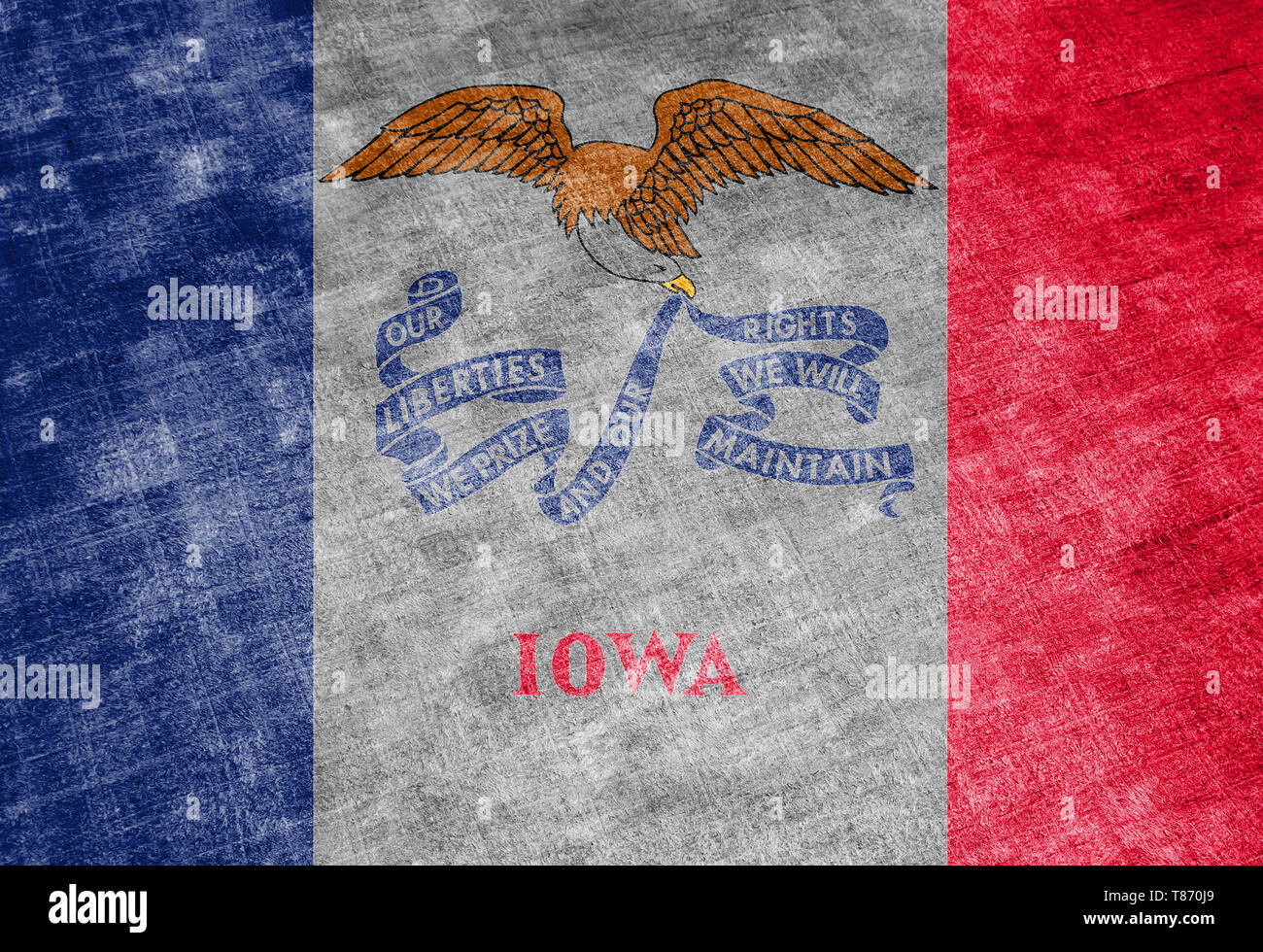 The national flag of the US state Iowa in against a gray textile rag on ...