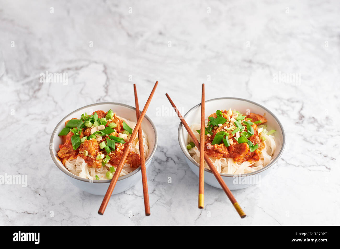 shan noodles with chopsticks at white marble tabletop. burmese cuisine ...