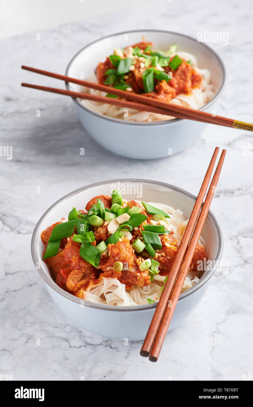 shan noodles with chopsticks at white marble tabletop. burmese cuisine ...