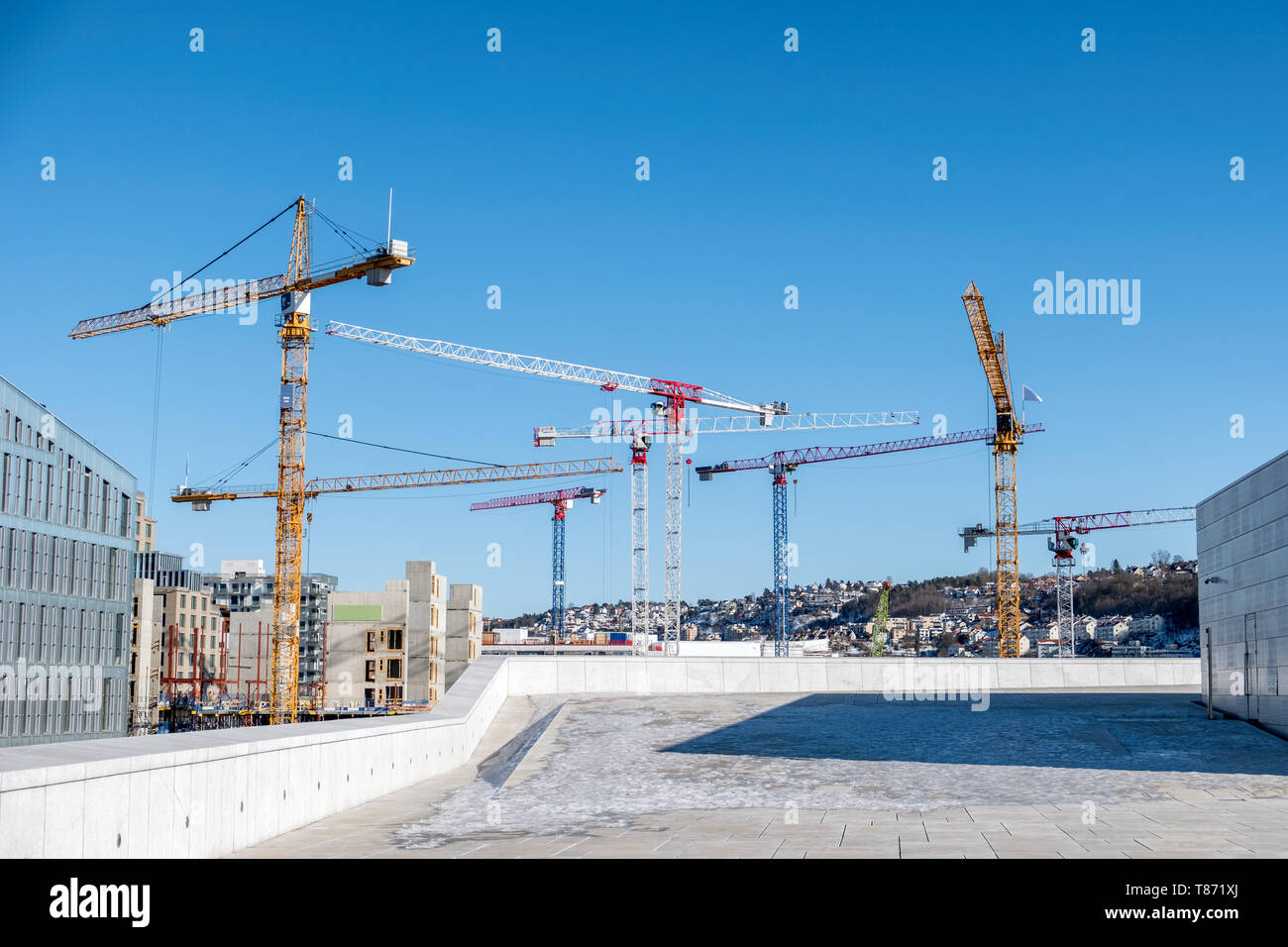 Panorama of construction building with cranes and derrick in the city ...