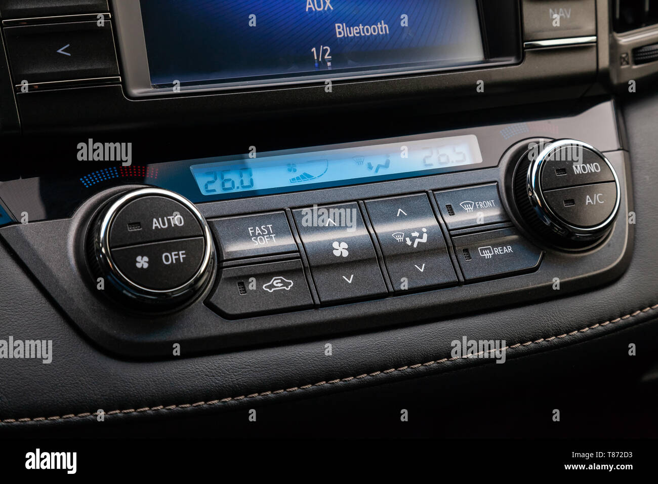 The central control console on the panel inside the car close-up with ...