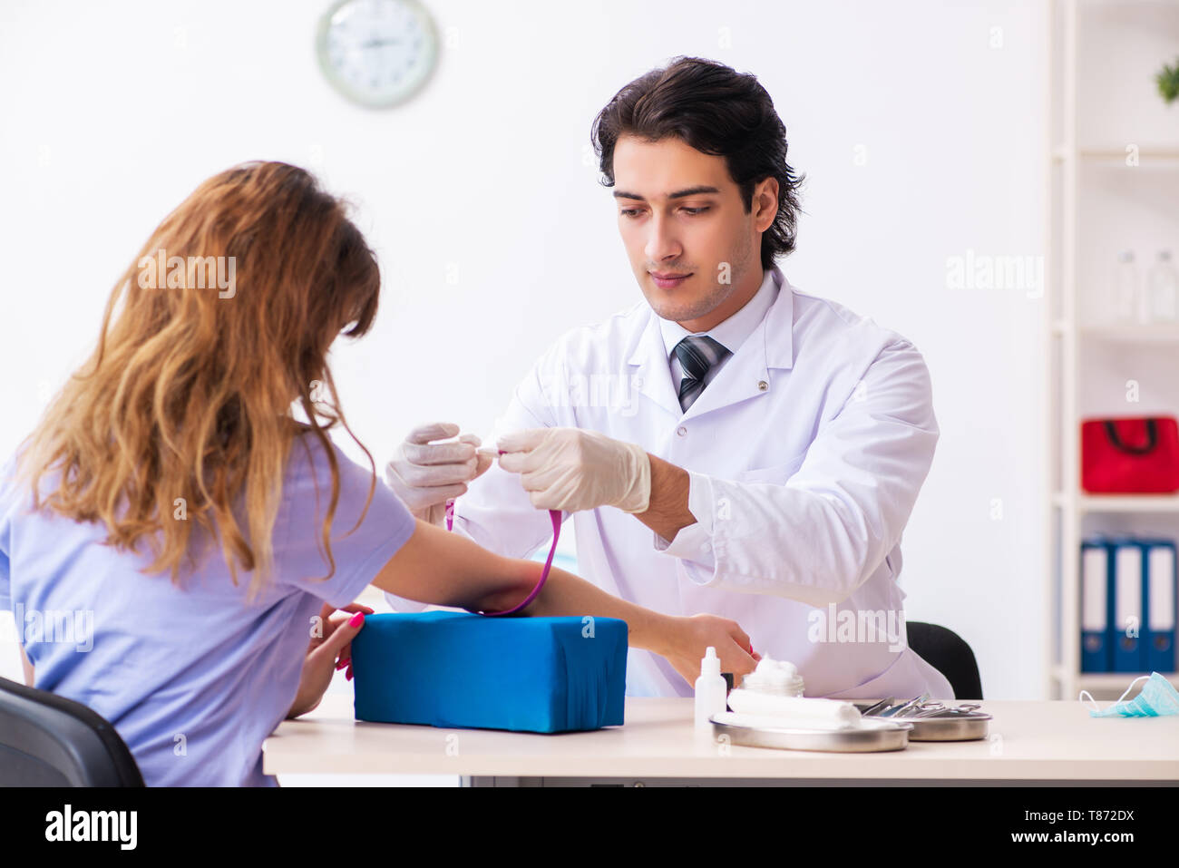 Female patient during blood test sampling procedure Stock Photo - Alamy