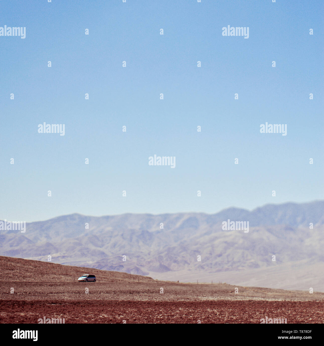 Automobile Driving Through Desert Stock Photo - Alamy