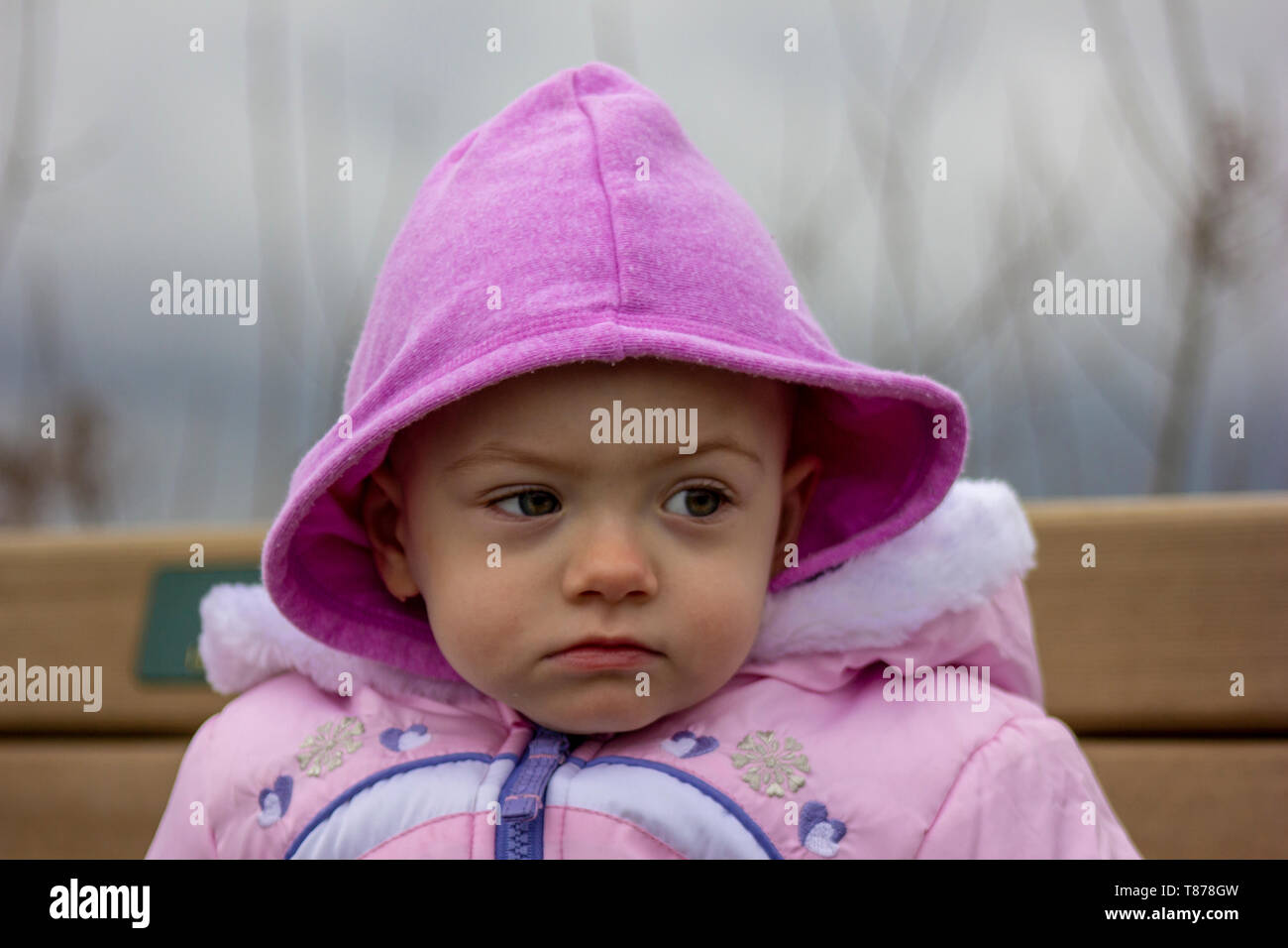 20 months old baby enjoying the nice weather outside. Toddler girl ...