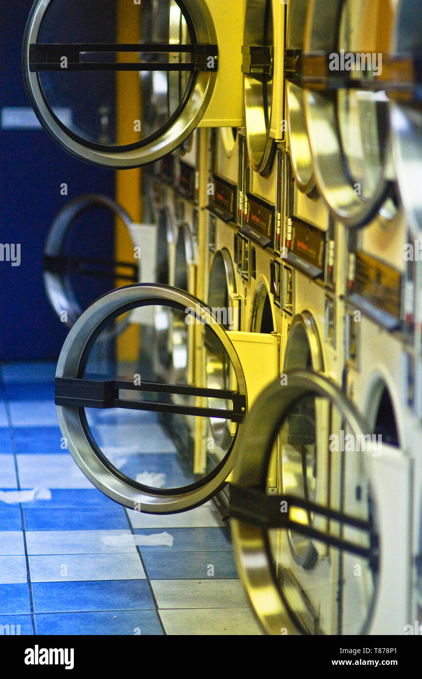 Washers and Dryers in Public Laundromat Stock Photo - Alamy