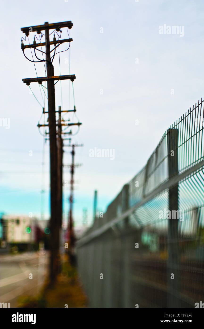 Fencing and Power Poles Stock Photo - Alamy