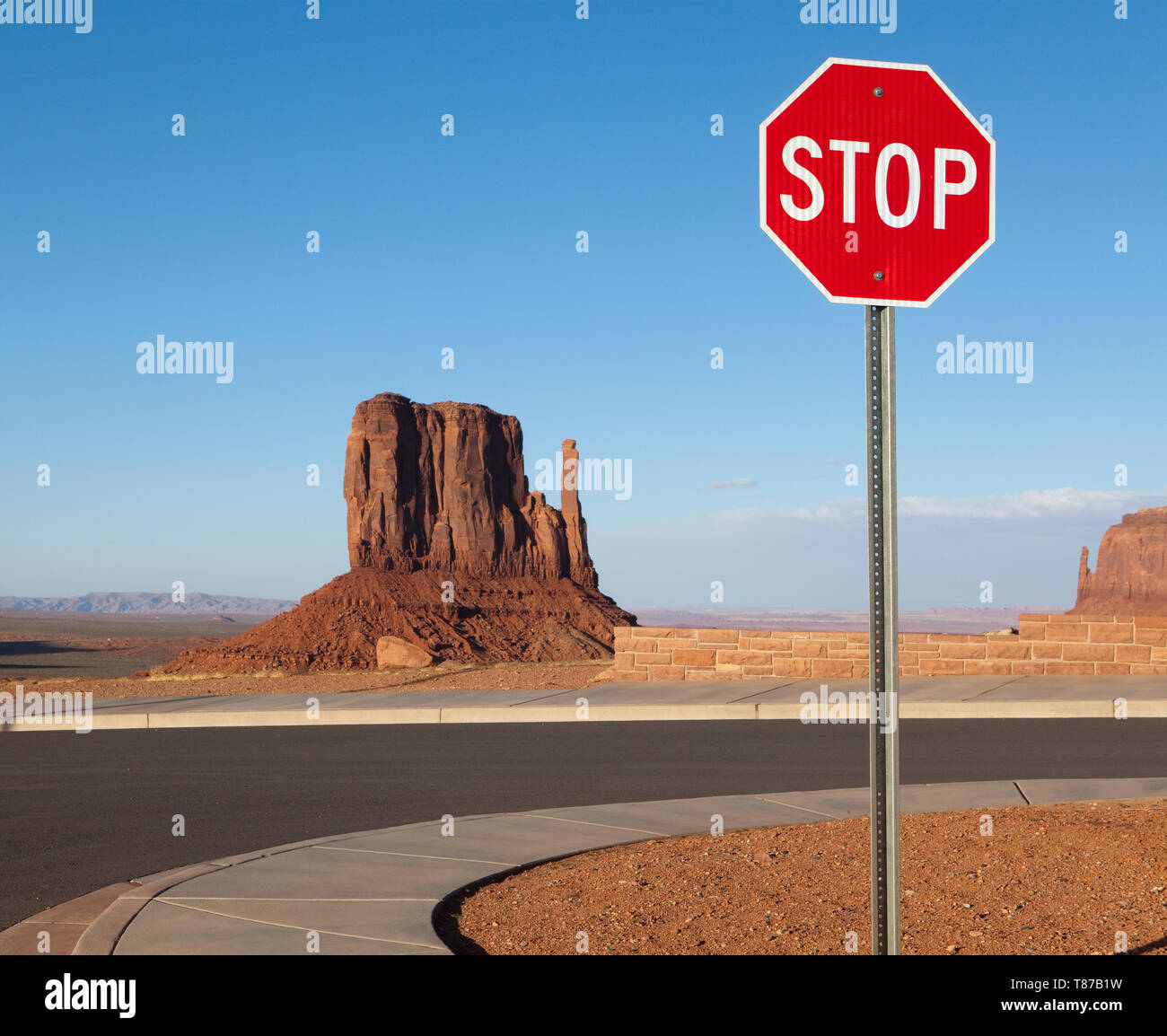Stop Sign and Mesa in the Desert Stock Photo - Alamy
