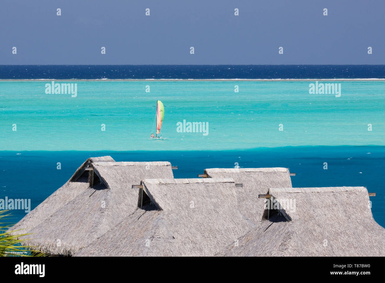 Sailboat in bay at Bora Bora Stock Photo - Alamy