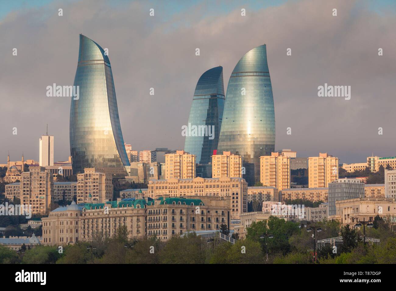 Azerbaijan, Baku, city skyline with Flame Towers form Baku Bay, dawn ...