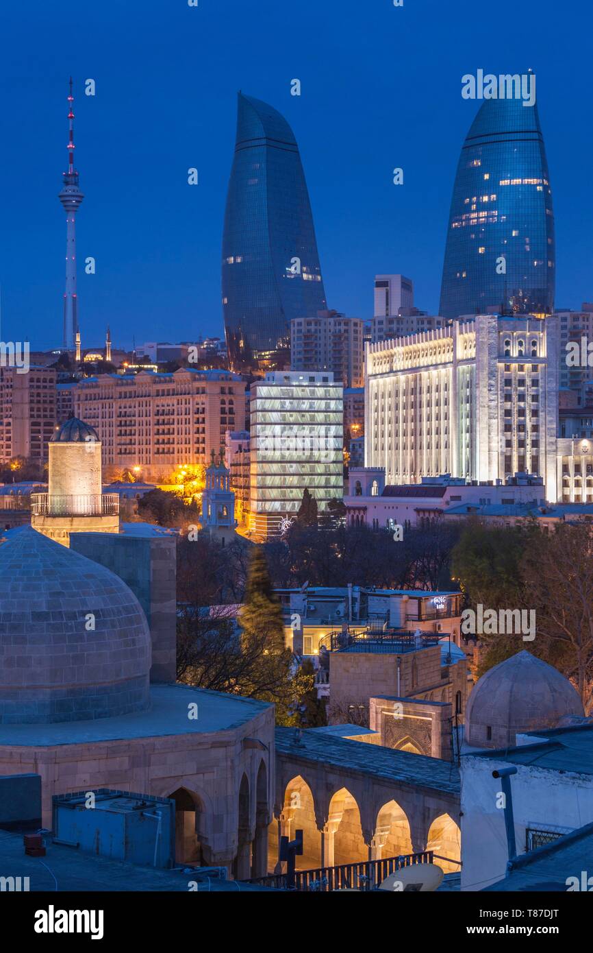 Azerbaijan, Baku, high angle skyline view with The Flame Towers, dawn ...