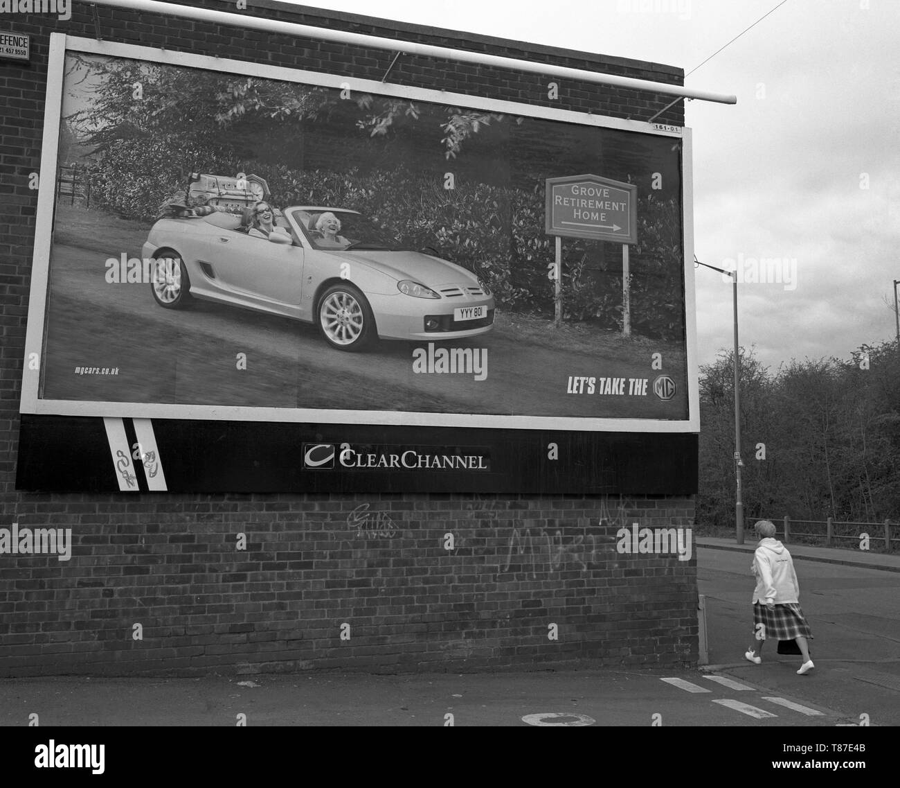 An advertisement poster outside the MG Rover Longbridge factory Stock ...