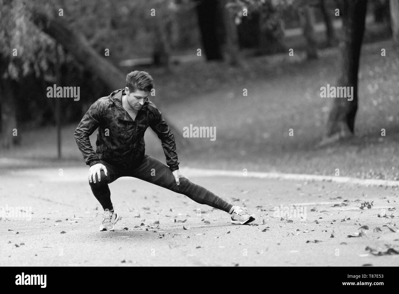 Athletic stretching healthy workout Black and White Stock Photos ...