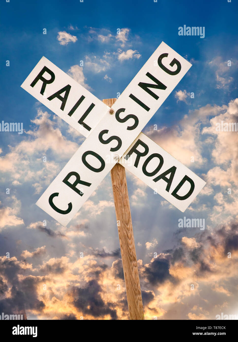 Simple railroad crossing sign cross Stock Photo - Alamy