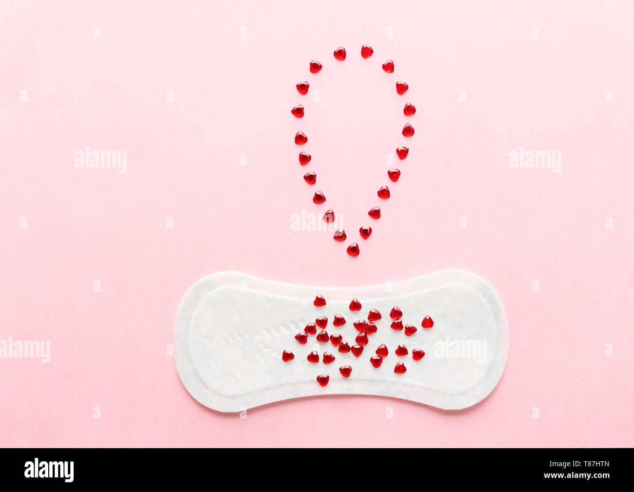 Feminine hygiene pad on a pink background. Concept of feminine hygiene ...