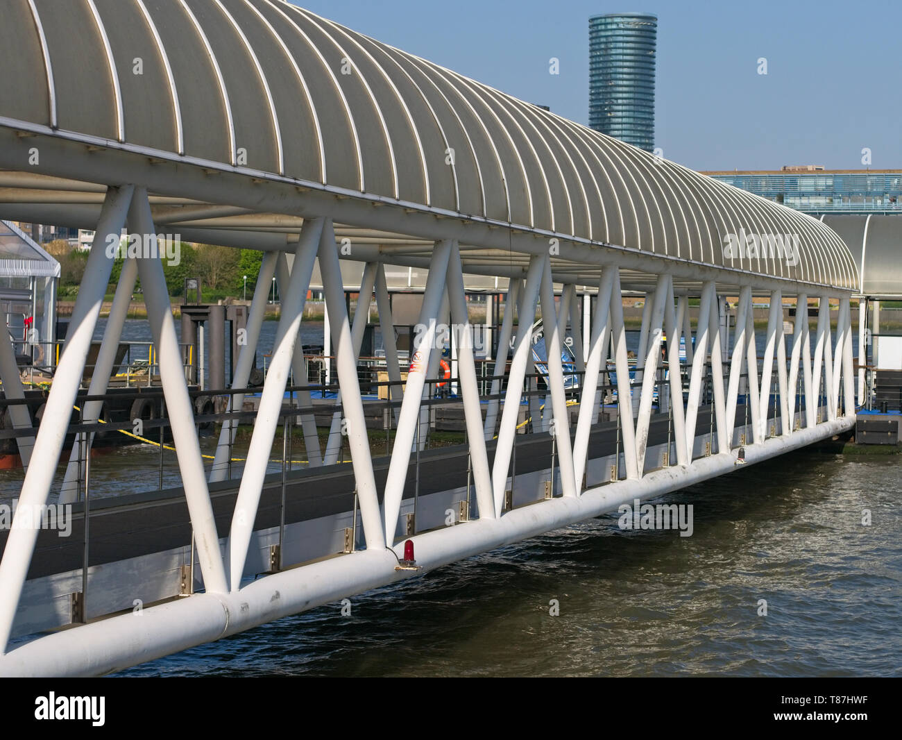 Perspective view of white steel bridge at Greenland Surrey Quays Pier ...