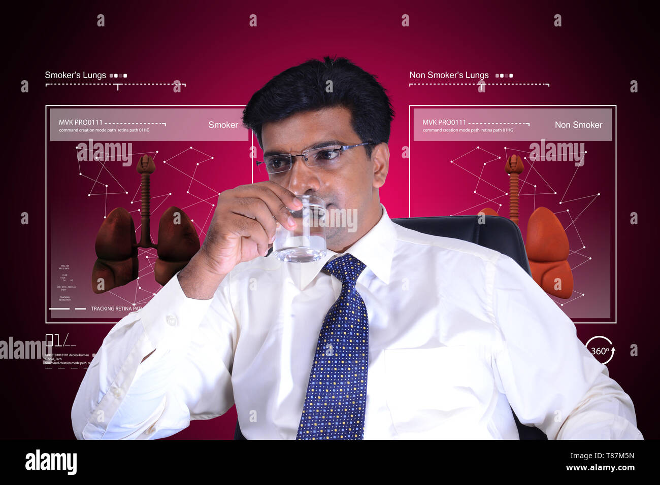 Young doctor drinking water Stock Photo - Alamy