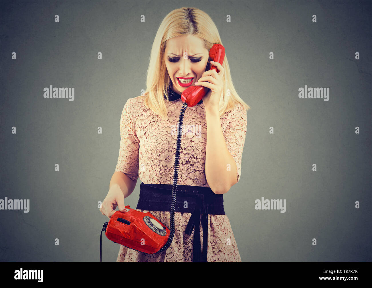 Woman receiving bad news hi-res stock photography and images - Alamy