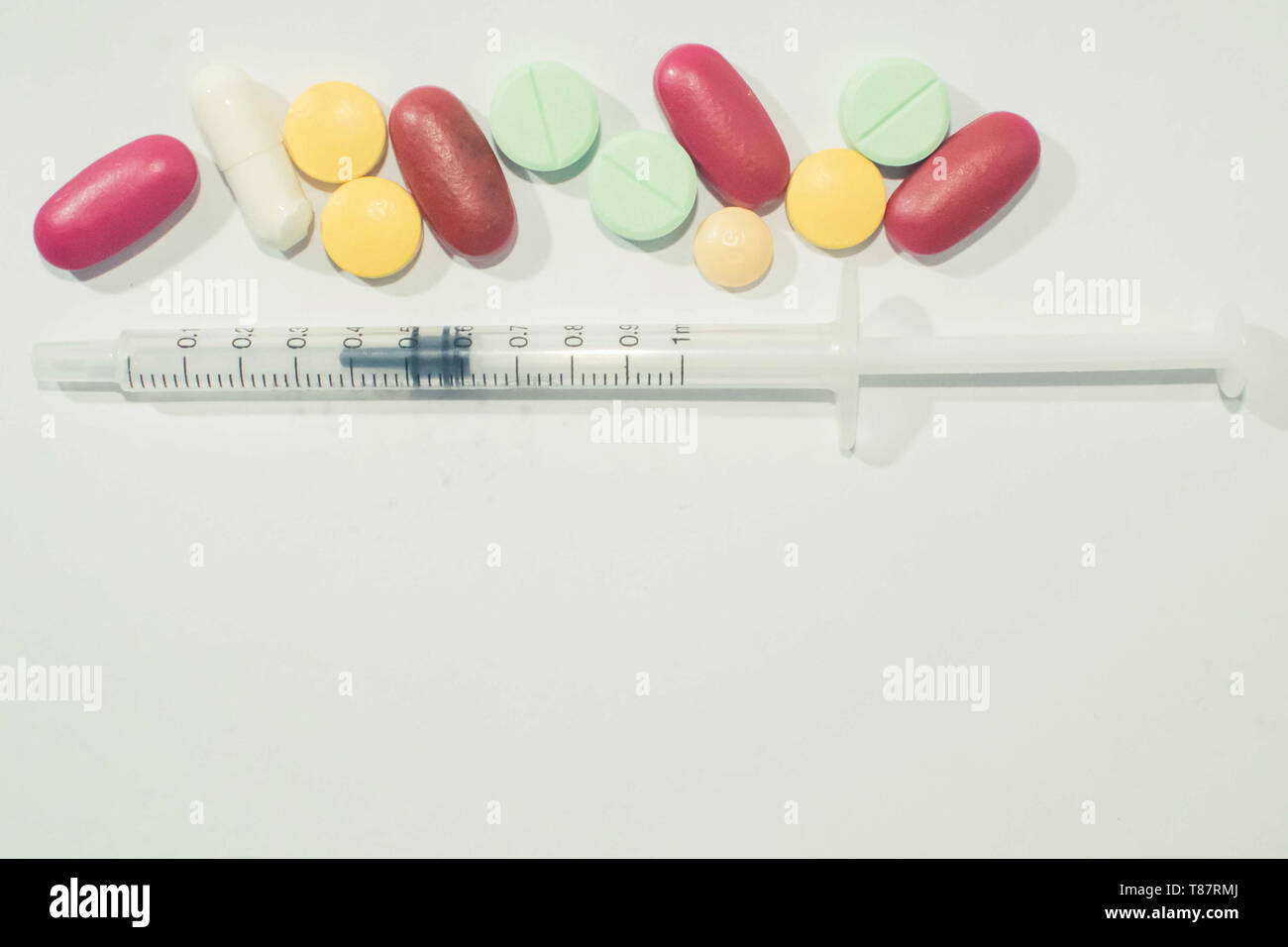 Variety of pills and and injection isolated on white background Stock ...