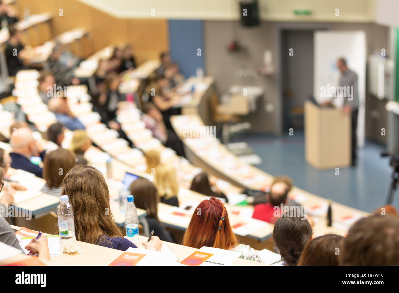 Expert speaker giving a talk at scientific business conference event ...