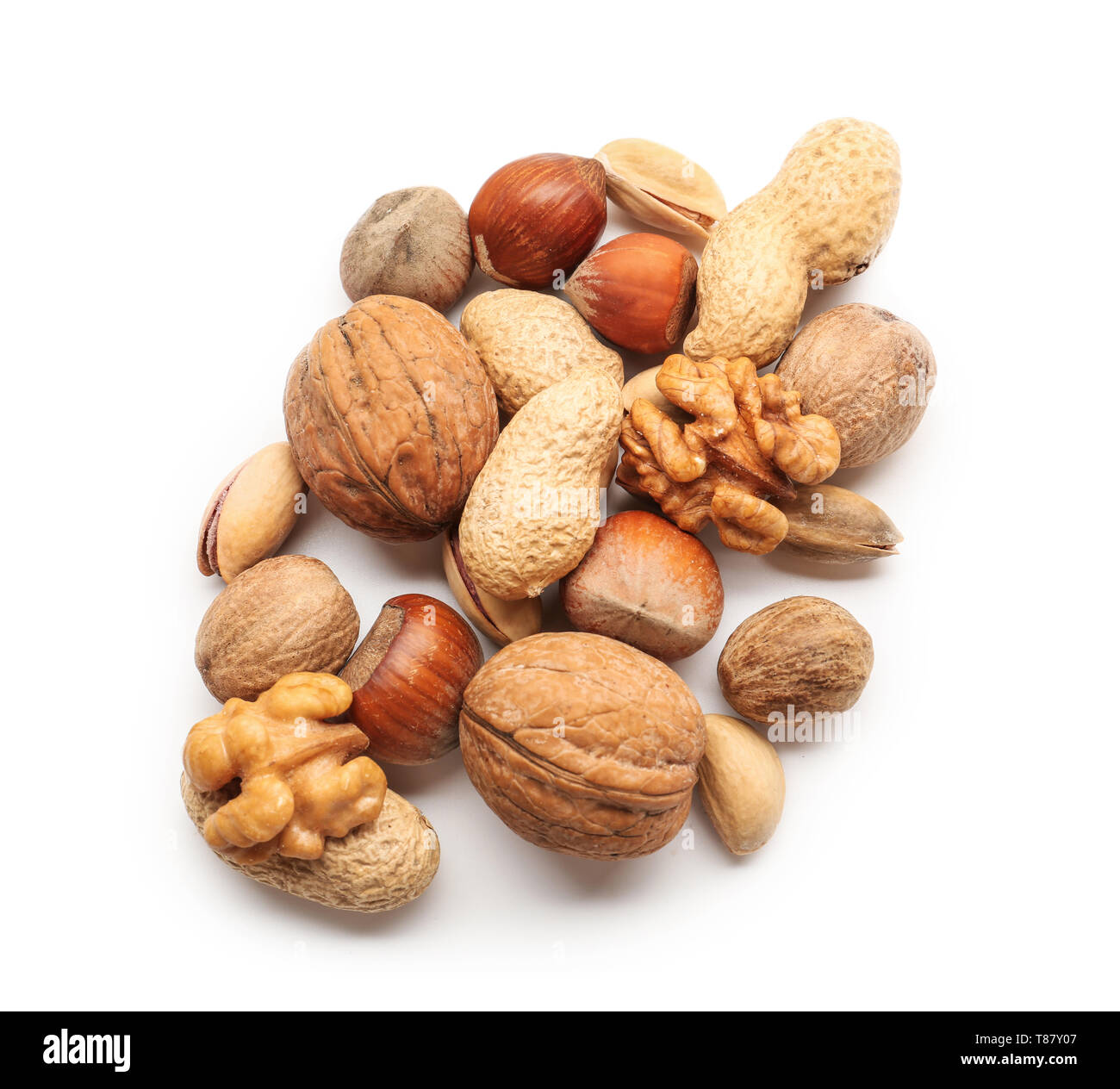 Different nuts on white background Stock Photo - Alamy